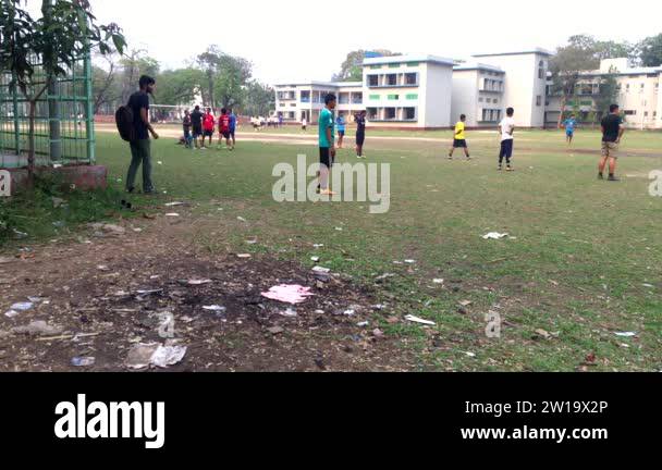 Young students playing cricket at the Dhaka Residential Model College ...