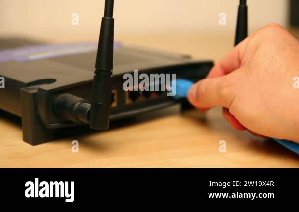 Cables into a router Stock Videos & Footage - HD and 4K Video Clips - Alamy