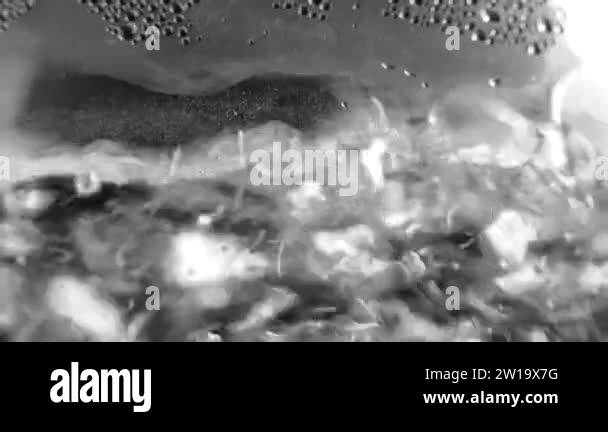 Boiling water. Air bubbles float in a liquid. Black-white texture Stock ...