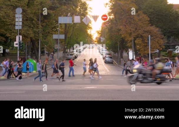 People walking on the street. Crowded street of the modern city. Motion ...