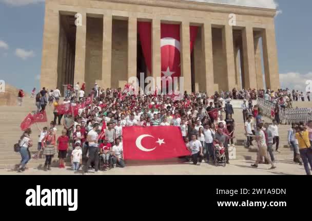 Ankara, Turkey - August 2019: Turkish people with Turkish flags infront ...