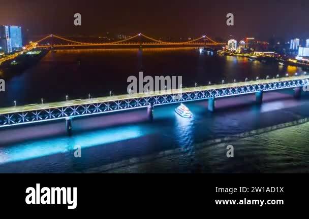 Night time illuminated Yangtze river bridges at Wuhan city china, 4k ...
