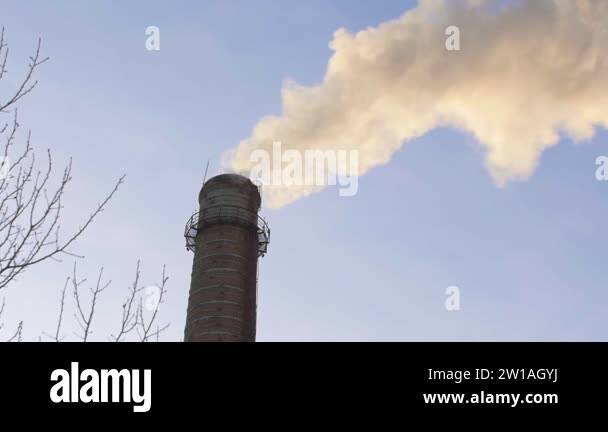 Industrial concept - smoke coming out of the pipe - pollution of an air ...