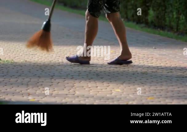 Employee sweeping street Stock Videos & Footage - HD and 4K Video Clips ...