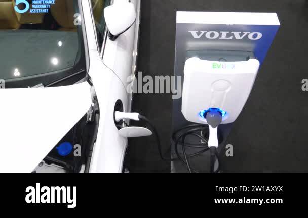 Electric Car Charging. New Volvo Car At Electric Car Charging At Motor ...