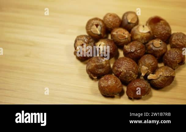 Soap nuts Indian soapberry or washnut, Sapindus mukorossi reetha or ...