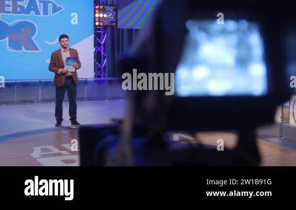 Male man TV presenter in a TV studio. TV presenter. TV host Stock Video ...