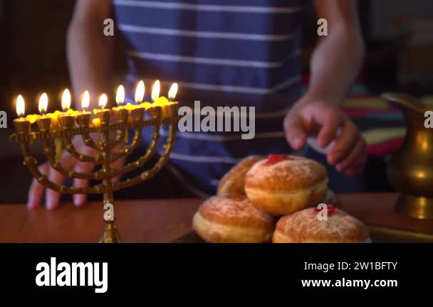 Menorah burning candles donut Stock Videos & Footage - HD and 4K Video Clips - Alamy