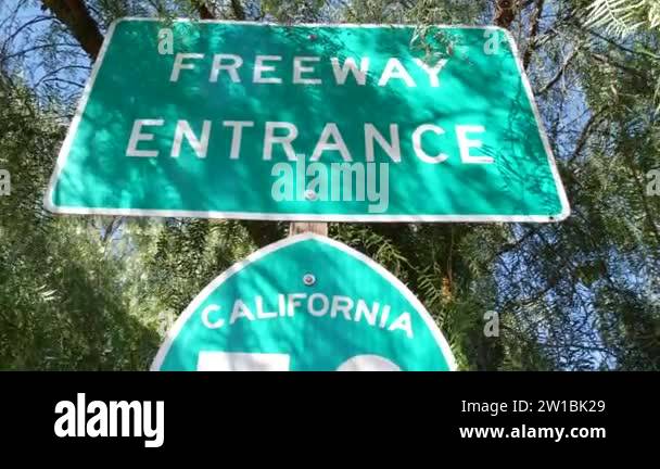 Freeway entrance sign on interchange crossraod in San Diego county ...
