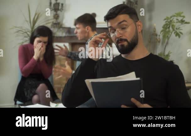 Portrait of adult Caucasian psychologist shaking head at the foreground ...