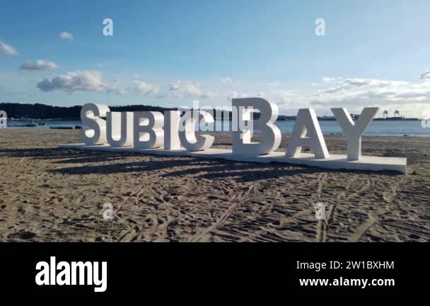 The famous Subic Bay sign landmark located on a small beach in the city of Subic Bay Olongapo ...