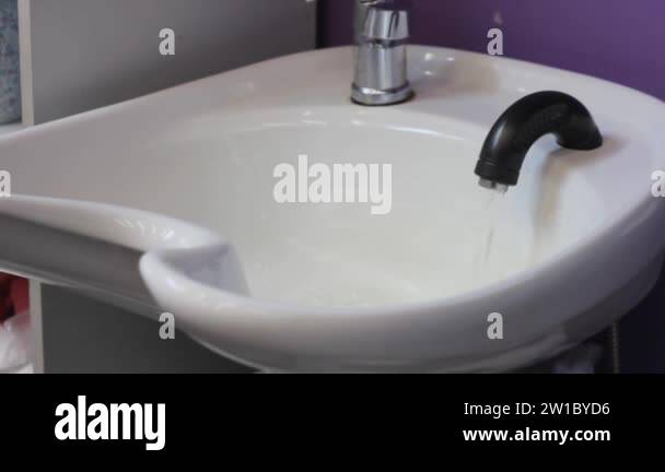 head wash basin at the hairdresser. workplace jet shower crane.wash ...