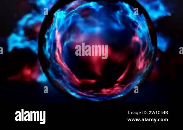 Fire flashes of a multi-colored flame. View through a crystal ball. A ...