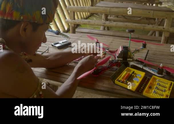 Young Indigenous Man Is Constructing A Diy Drone Stock Video Footage ...