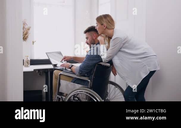 Attractive Positive Light Haired Woman Helping With Computer Project To
