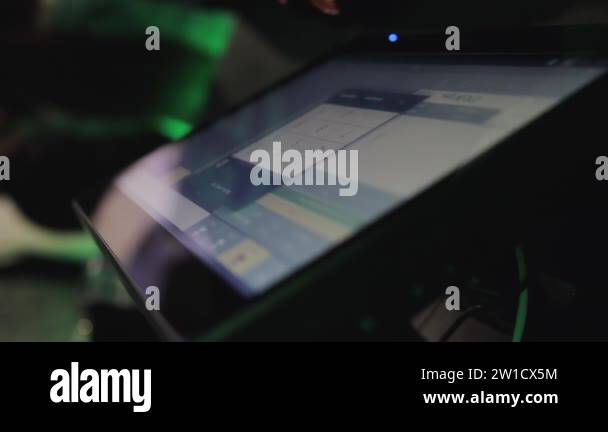 Restaurant worker typing on cash register, accepting an order from ...
