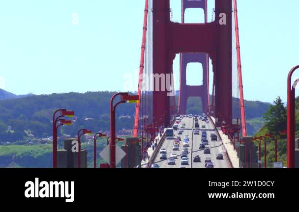 Traffic on the suspension bridge spanning the Golden Gate, the one-mile ...