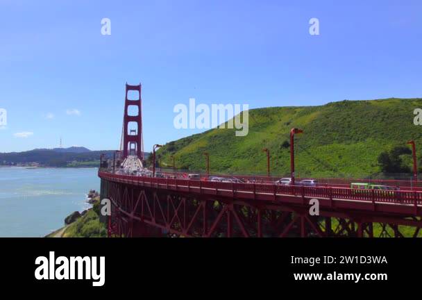 Traffic on the suspension bridge spanning the Golden Gate, the one-mile ...