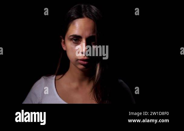 Sad and crying woman victim suffers from domestic violence in the ...