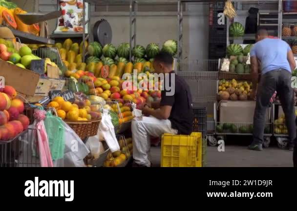 Unidentified people at the Mercado Municipal de Chacao market in the ...