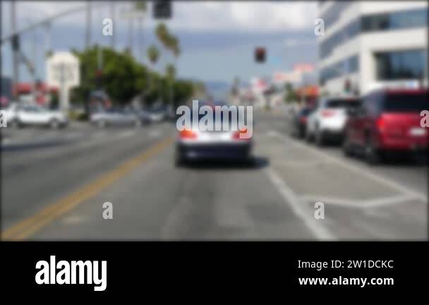 Driving on downtown streets of Los Angeles, California USA. Defocused ...