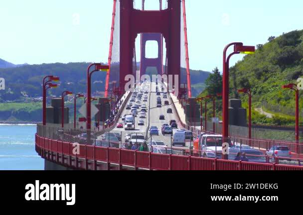 Traffic on the suspension bridge spanning the Golden Gate, the one-mile ...