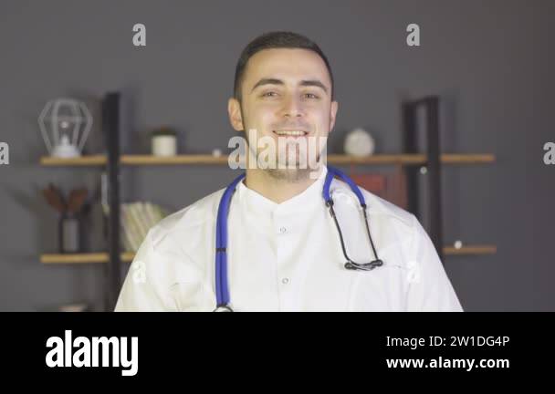 Smiling happy doctor giving a perfect ok gesture with his fingers ...