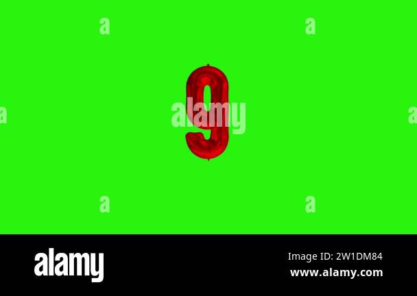 Number 9 nine ninth year celebration red foil balloon floating on green ...