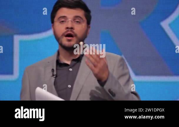 Male man TV presenter in a TV studio. TV presenter. TV host Stock Video ...