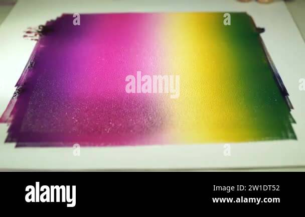 Mixing colors using a roller to rotate colors so that each color is ...