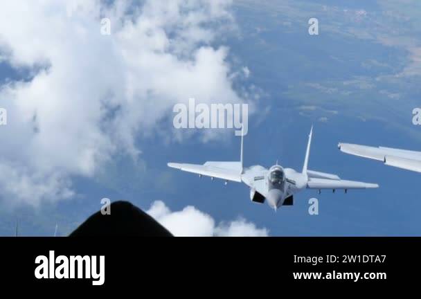 Photographers on a Cargo Aircraft Take Pictures of MiG29 Fighter Jets ...