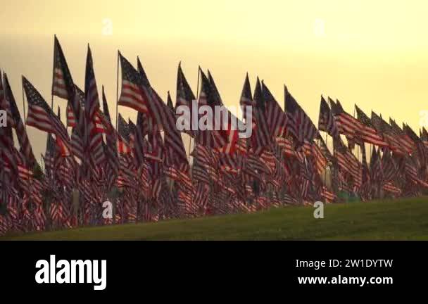 Set of American flags fluttering in the wind on the Memorial Day On the ...