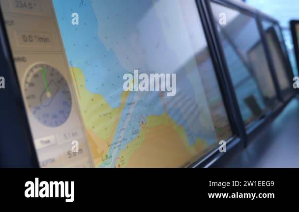 Two ship control screens with networks and maps on it on a moving ...