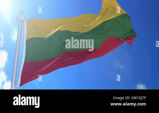 Lithuania animated flag in the wind with blue sky in the background ...