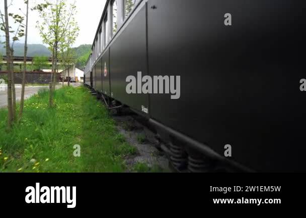 walking along the retro train, Old steam locomotive close-up, Steam ...