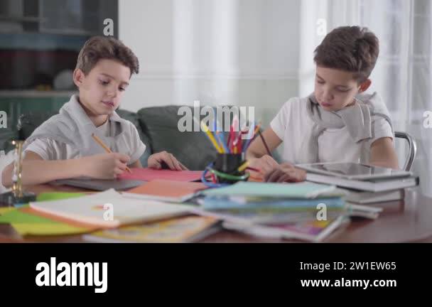 Siblings drawing together table Stock Videos & Footage - HD and 4K ...