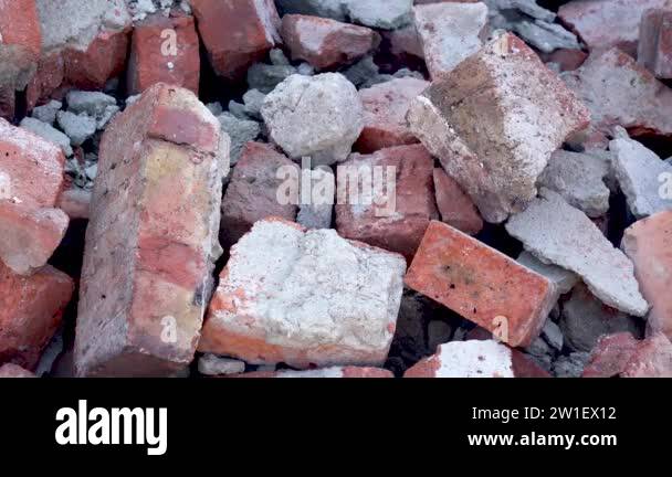 The mans hand is released from under the rubble of stones. The victim ...