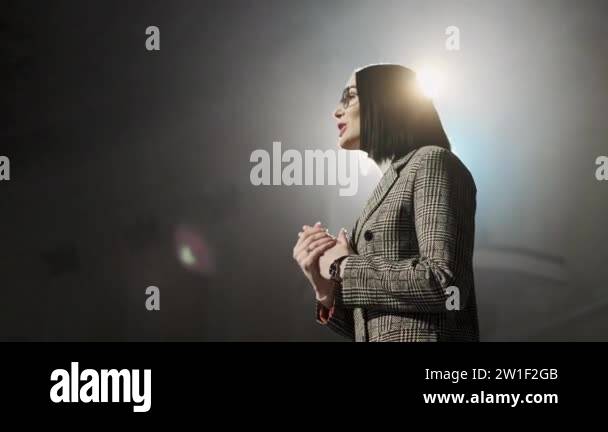 Expert perform on the stage address to modern crowd audience sitting ...