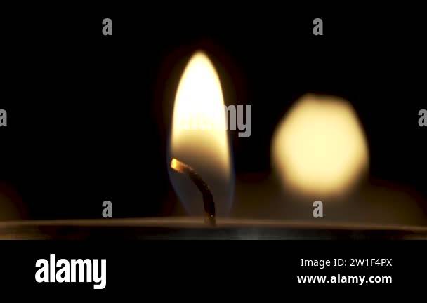 The wick of a burning candle and the waving of a flame Stock Video ...