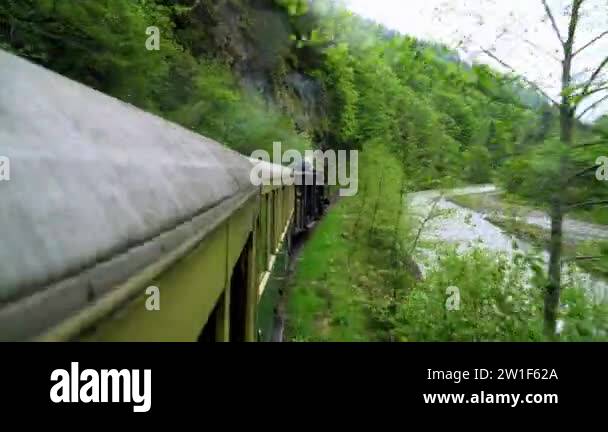 view from the roof of a retro train wagon, Old steam locomotive in ...