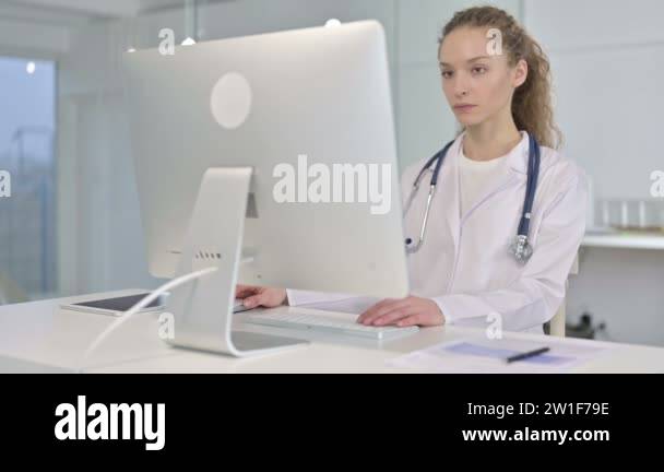Portrait of Ambitious Young Female Doctor Working on Desk Top Stock ...