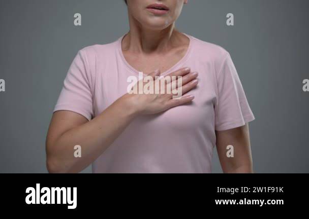 Lady feeling pain in heart, tachycardia, prevention of stroke and heart ...
