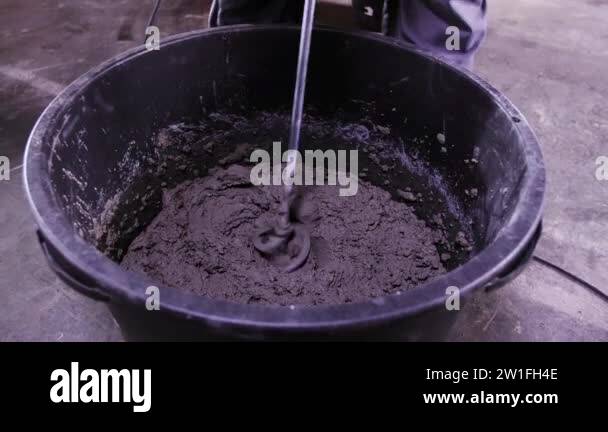 Female mason shovel Stock Videos & Footage - HD and 4K Video Clips - Alamy