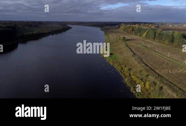 Drone aerial video panorama of hamlet with houses and gardens on a ...
