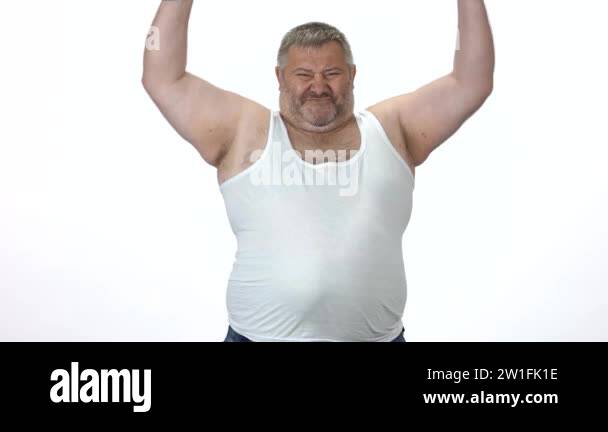 Obese man lifting heavy dumbbells, front view Stock Video Footage - Alamy