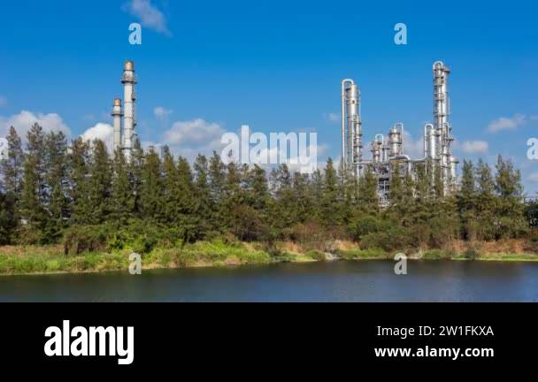 Time lapse with cloud movement over petrochemical, petroleum, chemical ...