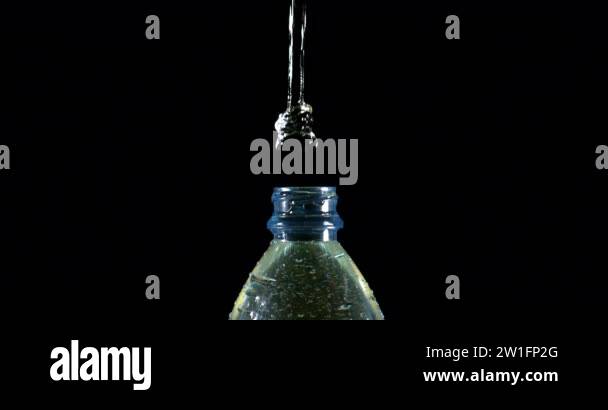 Water Exploding and Splashing on Bottle against Black Background, Slow ...