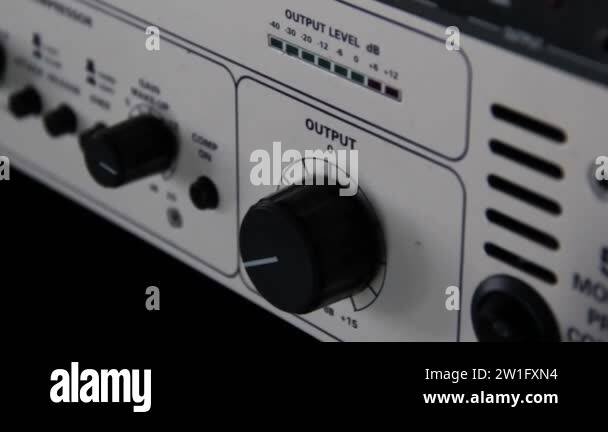 A rack of audio compressors and other components of sound reinforcement ...