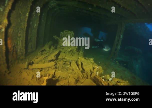 Diver on shipwreck underwater of Pacific Ocean on Chuuk Islands Stock ...