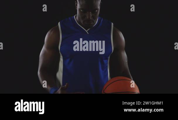 Portrait close up of a muscular African American male basketball player ...